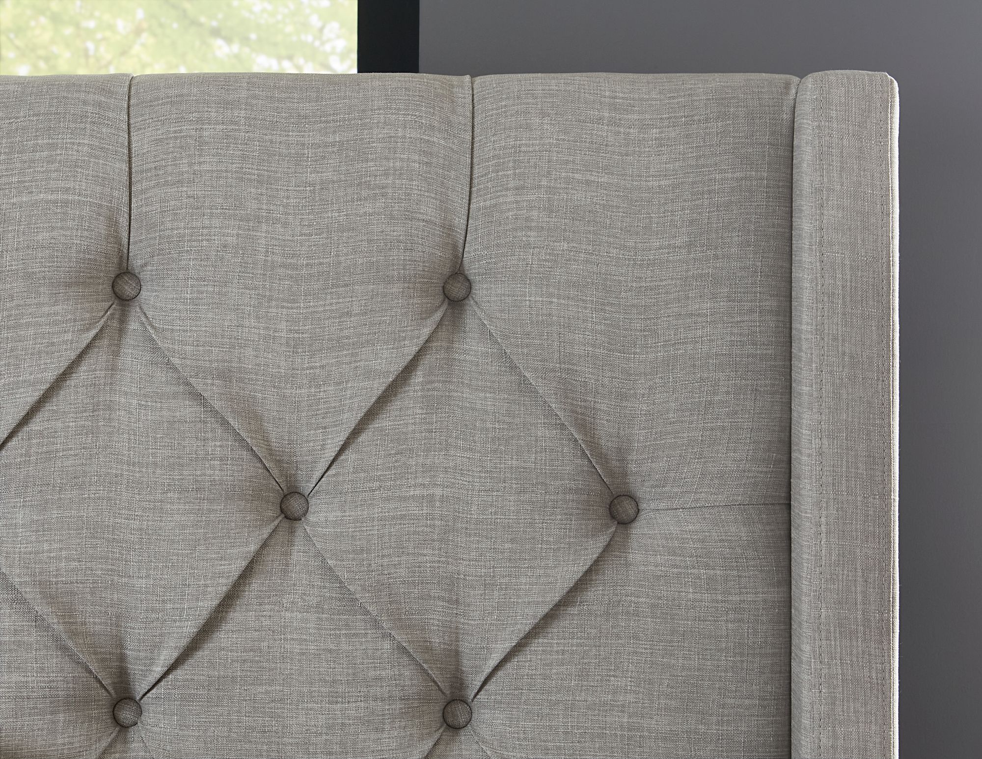 Grey upholstered bed with footboard store